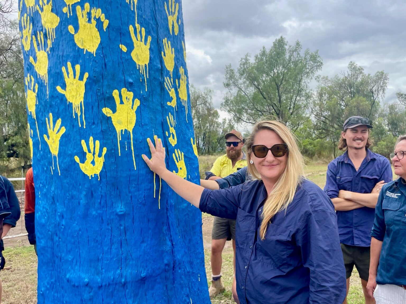 Yellow hands a striking canvas of support for rural community - The Courier
